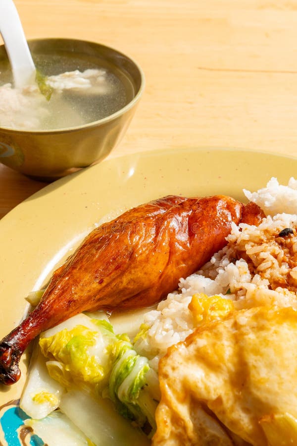 Fast Food Roasted Duck Thigh with Scrambled Egg and Cabbage and Rice at ...