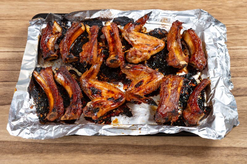 Angle View Fresh Baked Chicken Wing and Pork Ribs Horizontal ...