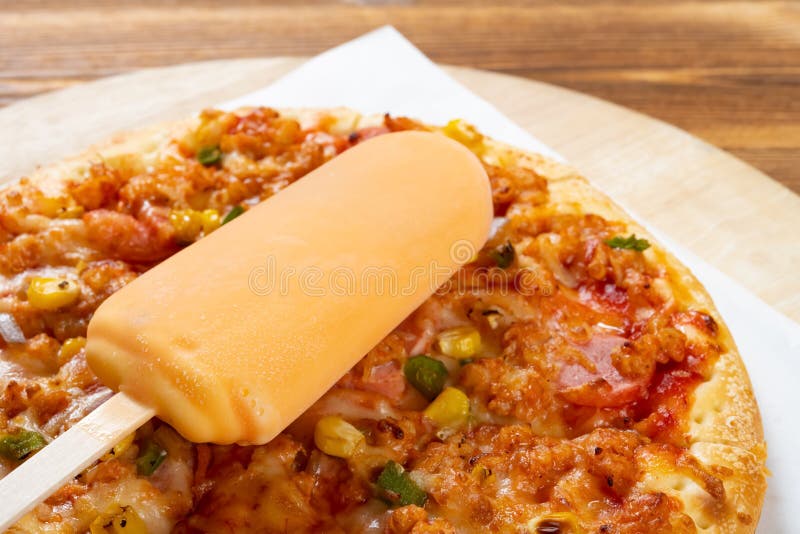 Fresh Chicken and Bacon Pizza with a Chocolate Popsicle on Top Stock ...