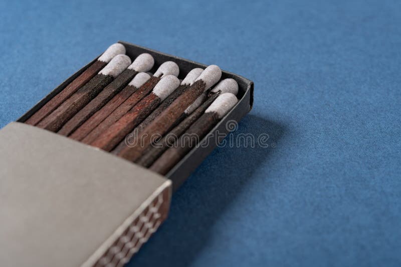 Angle View Grey Color Matchbox and Grey Match Sticks on Blue Background ...
