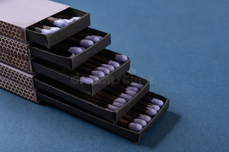 Lilac Matchboxes on a Blue Background at Horizontal Composition Stock Image - Image of ...