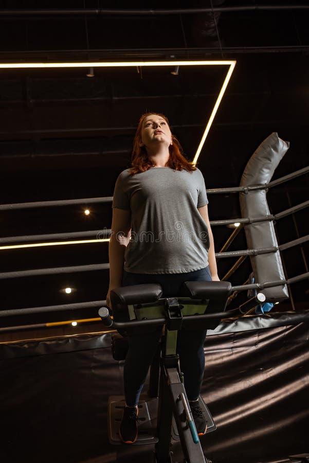 Angle View of Overweight Girl Doing Lower Back Extension Exercise on ...