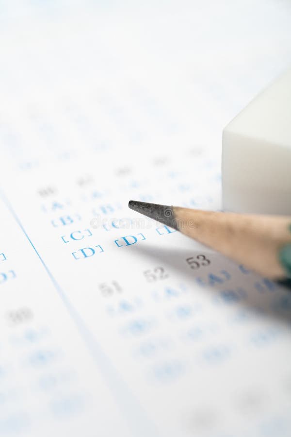 Test Score Sheet and Pencil and Eraser Close Up Vertical Composition ...