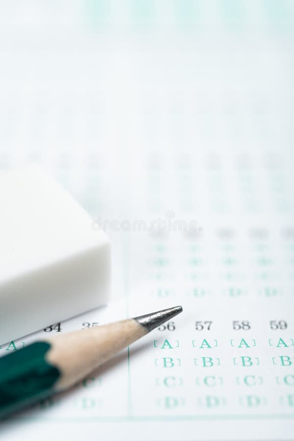 Test Score Sheet and Pencil and Eraser Close Up Vertical Composition ...