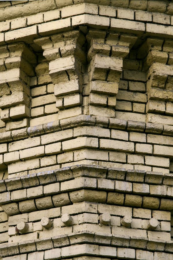 Yellow cracked brick wall stock photo. Image of spotted - 33957834