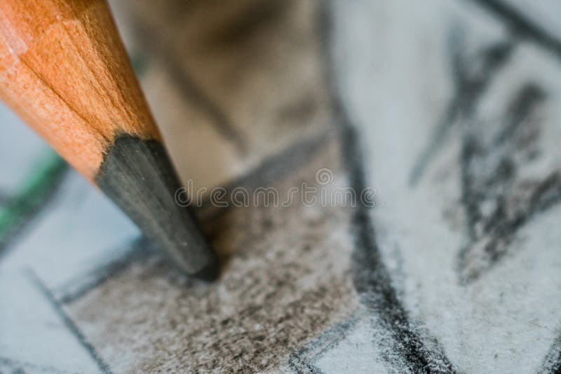 Angled Close Up Macro Of A Graphite Pencil Drawing A Line On Textured ...