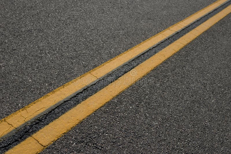 Angled Double Yellow Road Lines Stock Image - Image of background ...