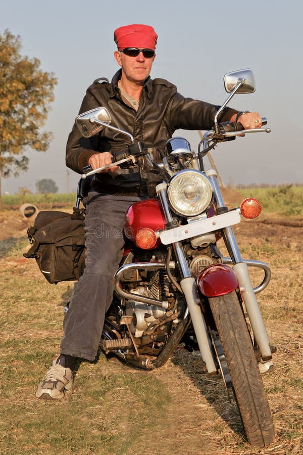 Angled Portrait of Bike Rider in India Stock Image - Image of bags ...