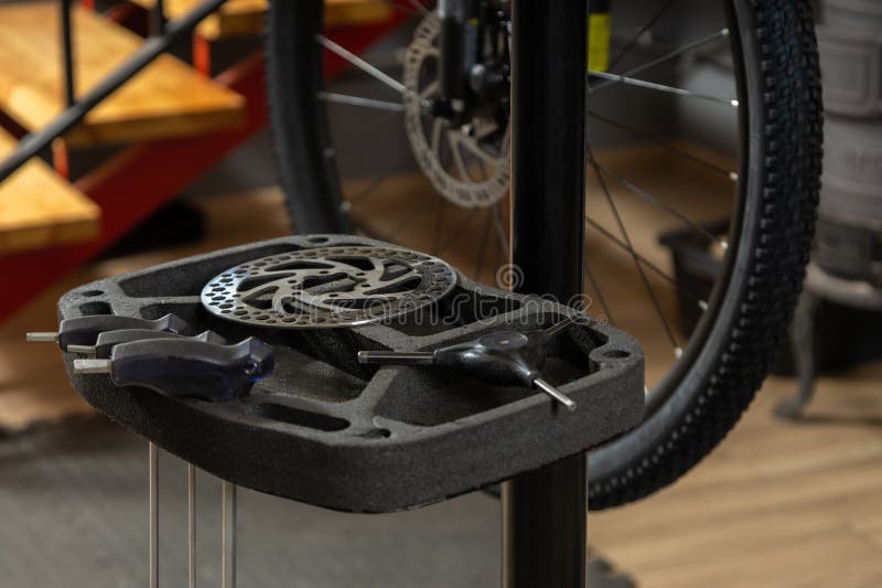 Angled View of Bicycle Wheel on Repair Stand Stock Photo - Image of ...