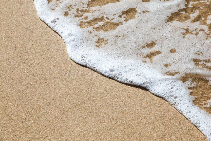 Angled Wave with Foam Over Sand Stock Image - Image of wave, idyllic ...