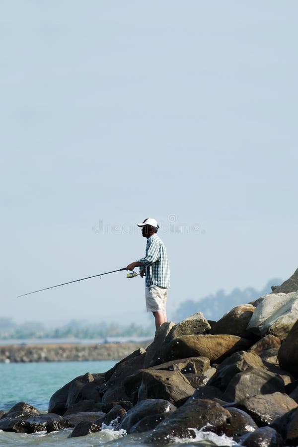 Angler stock photo. Image of fish, lake, catch, line, hook - 965040