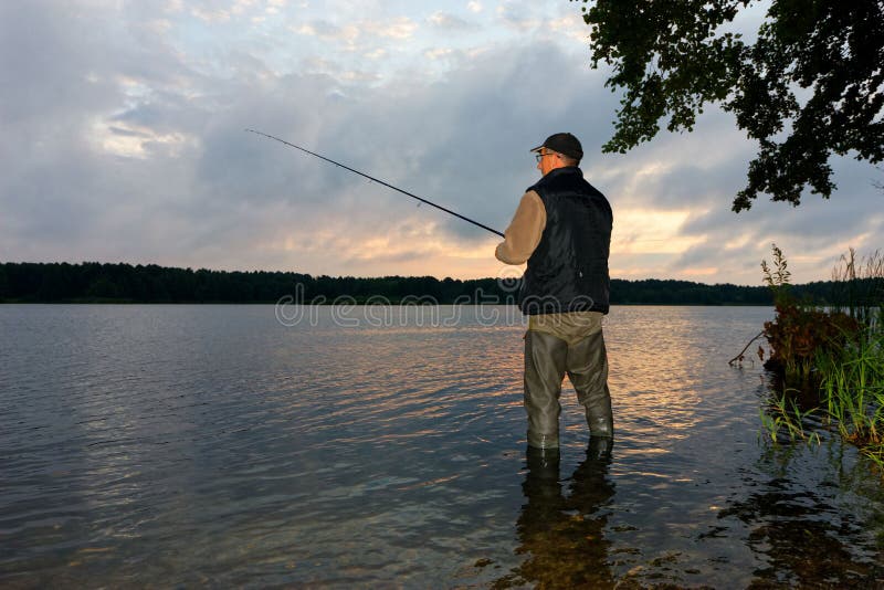 Angler stock photo. Image of sunrise, catching, alone - 122992368