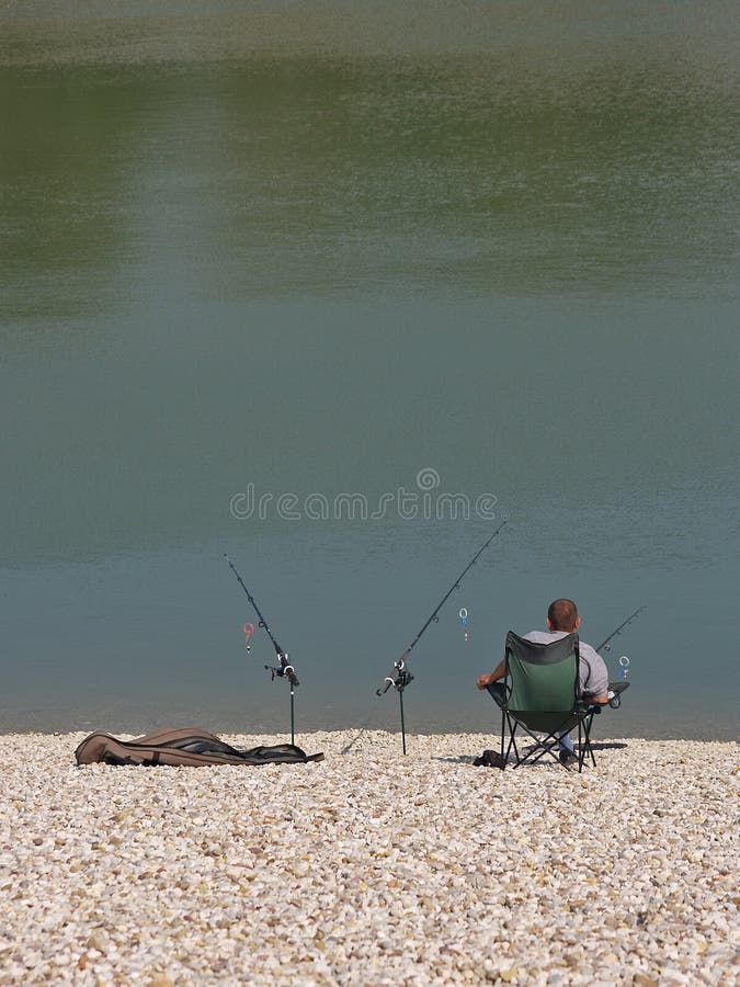 Angler Enjoying Peace at Lake Shore Stock Image - Image of fisherman ...