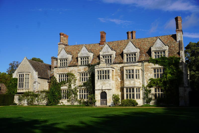 Anglesey Abbey in the sun stock photo. Image of door - 258710914