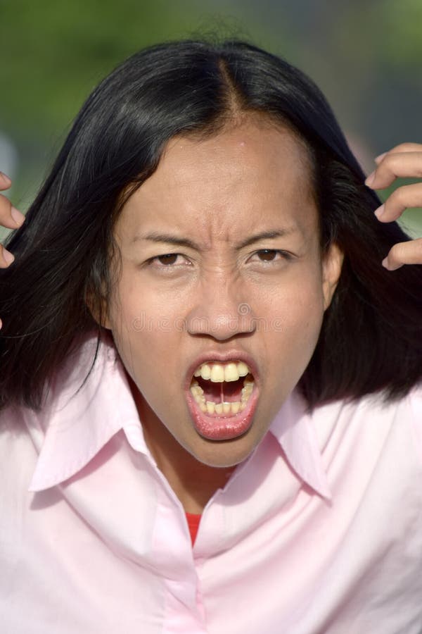 An Angry Adult Female stock photo. Image of older, emotion - 154645932