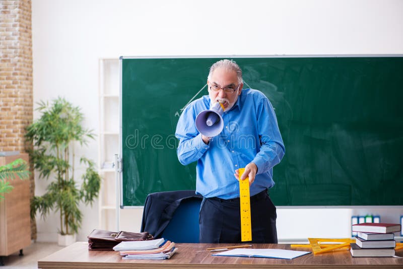 Angry Teacher Holding Ruler Stock Photos - Free & Royalty-Free Stock ...