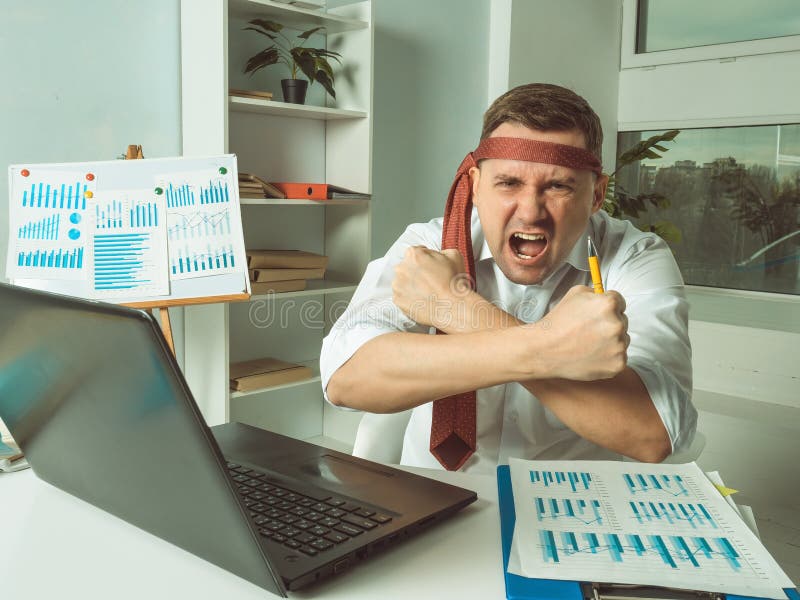 Angry Aggressive Employee at the Table in Office. Stock Image - Image ...