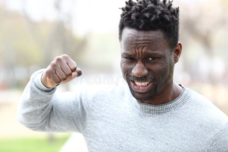 Angry Black Man Threatening Looking at Camera Stock Image - Image of ...