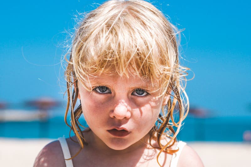 Angry blond baby girl stock photo. Image of adorable - 81022502