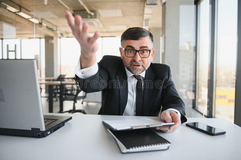 Angry Boss Behind of Office Table Stock Image - Image of businessman ...