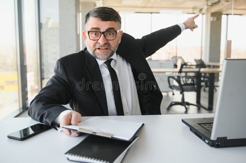 Angry Boss Behind of Office Table Stock Image - Image of conflict, desk ...