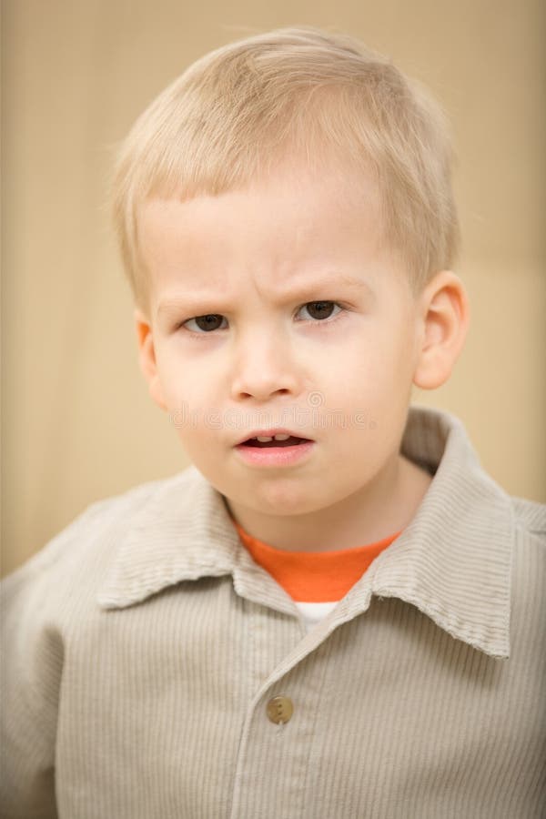 Angry boy stock image. Image of looking, indoors, corduroy - 8142685