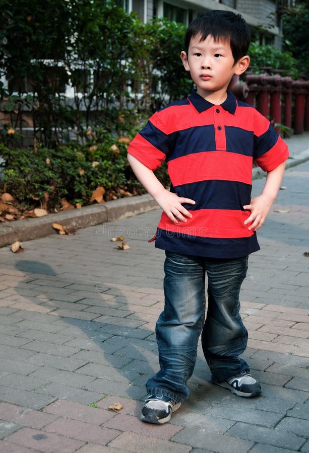 Angry boy stock image. Image of shirt, child, stand, emotion - 9076183