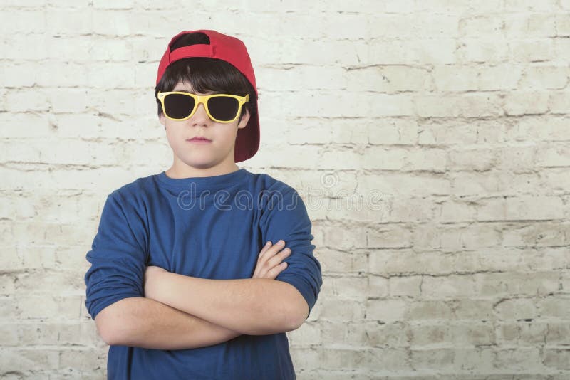 Angry boy with sunglasses stock photo. Image of isolated - 49308850