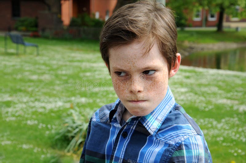 Angry boy stock photo. Image of unhappy, glance, bugged - 41574382