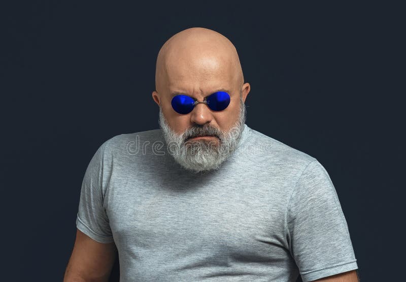 Angry Broad Shouldered Man with Gray Beard Wearing Dark Glasses Looking ...