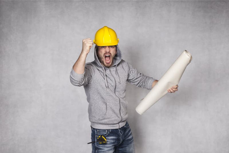 Angry Builder Holding Blueprints in Hand Stock Image - Image of ...