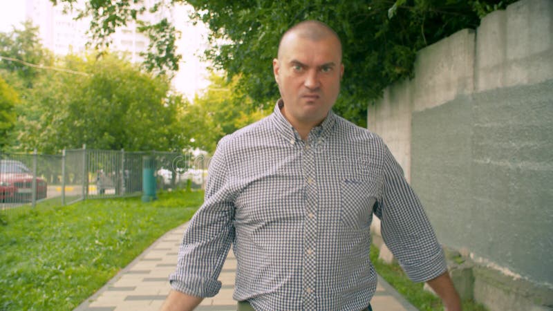 An Angry Bully with a Bat in His Hands Stock Footage - Video of outlaw ...