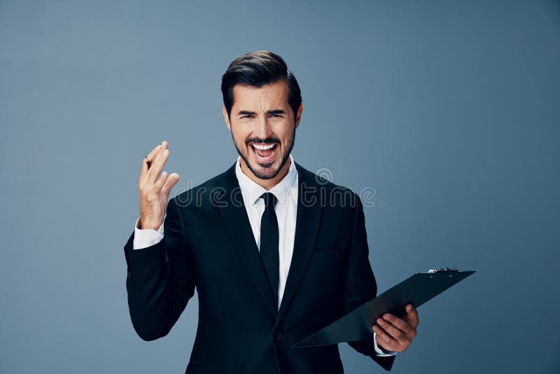 An Angry Business Man with a Headache is Holding a Folder of Notes in ...