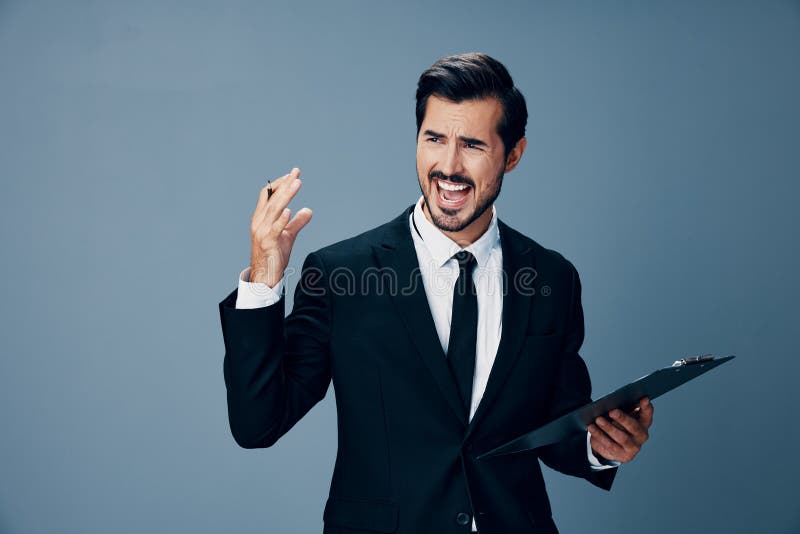An Angry Business Man with a Headache is Holding a Folder of Notes in ...