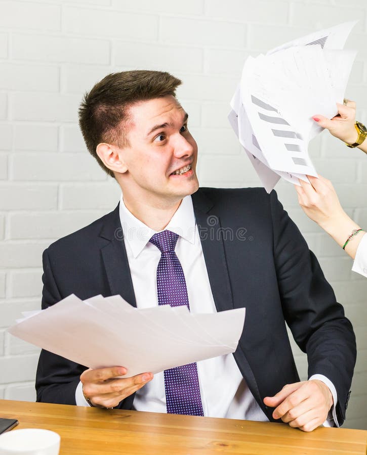 Angry Business Man Working at Office with Documents on His Desk Stock ...
