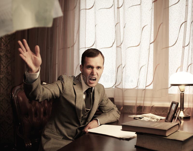 Angry Businessman Behind Table Stock Photo - Image of adult, anger ...