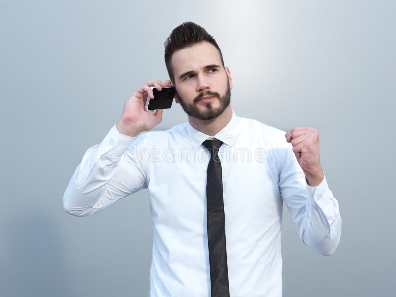 Angry Businessman at the Cell Phone Stock Photo - Image of business ...
