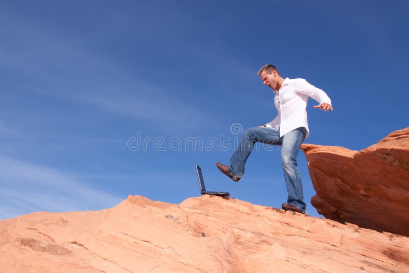 Angry Businessman Kicking His Laptop Stock Photo - Image of rock, yell ...