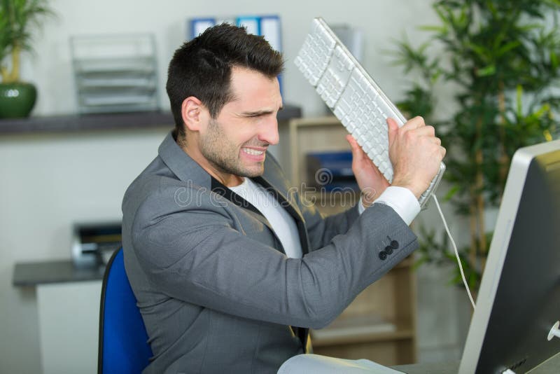 Angry Businessman Wearing Paper Bag with Drawing Angry Face Stock Photo ...