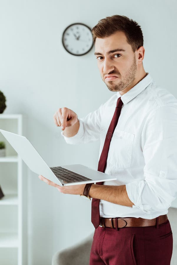 Angry Businessman Pointing at Laptop Stock Image - Image of alone ...