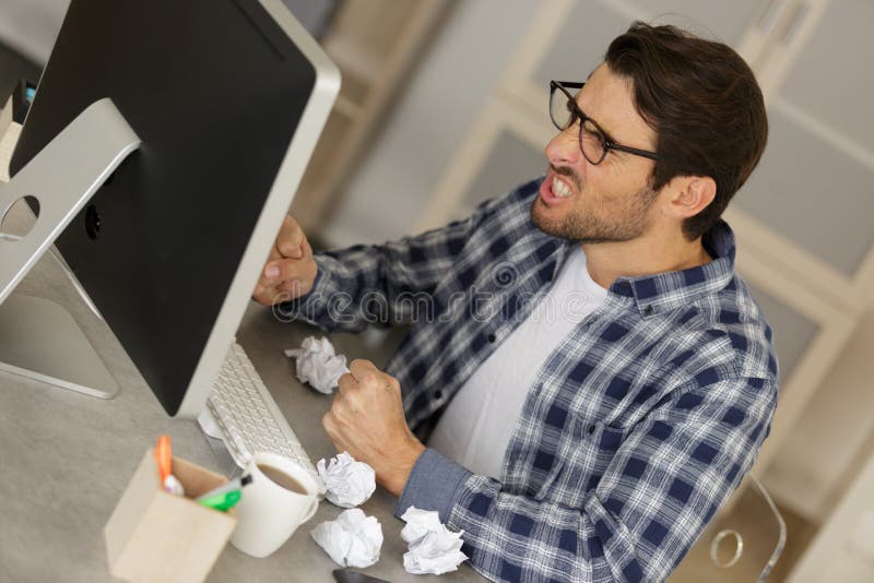Angry Businessman Using Computer in Office Stock Photo - Image of ...