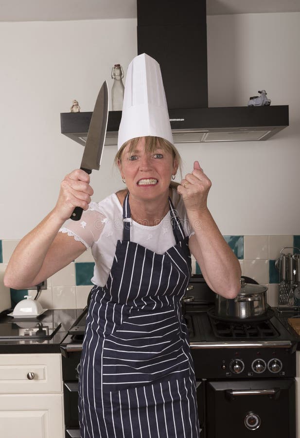 Angry Chef Holding a Large Knife Stock Image - Image of knife, apron ...
