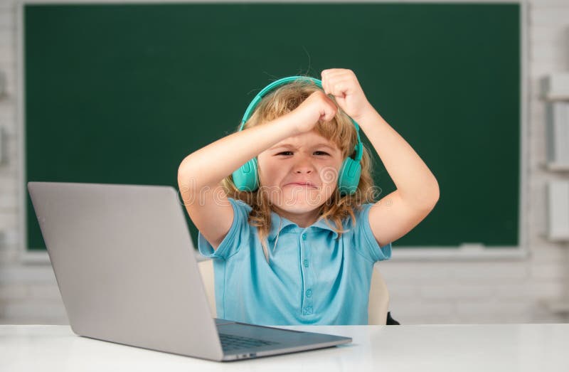 Angry Child Using Laptop Computer, Sad Excited Kid Boy Studying through ...