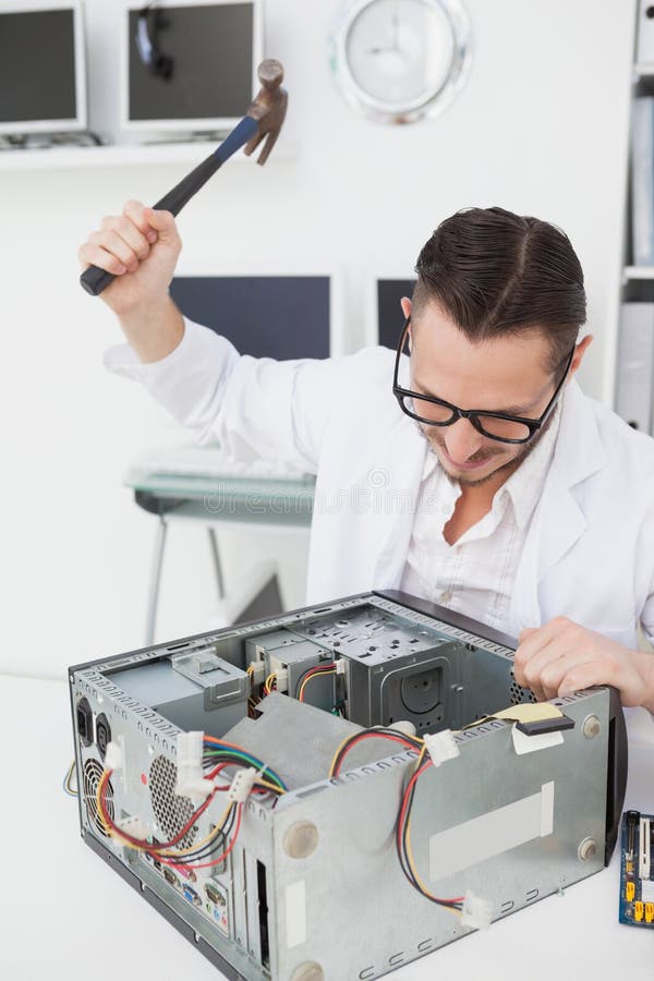 Angry Computer Engineer Holding Hammer Over Console Photos - Free ...