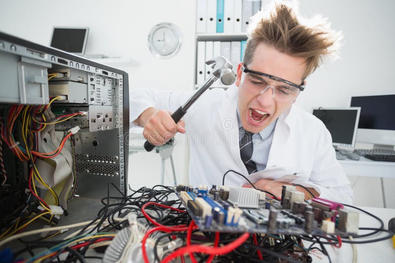 Angry Computer Engineer Holding Hammer Over Console Stock Photos - Free ...