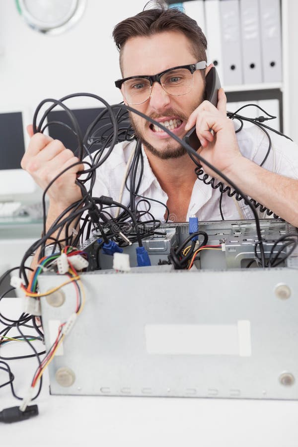 Angry Computer Engineer Making a Call Stock Image - Image of ...