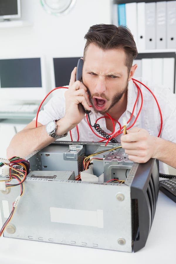 Angry Computer Engineer Making a Call Stock Image - Image of ...