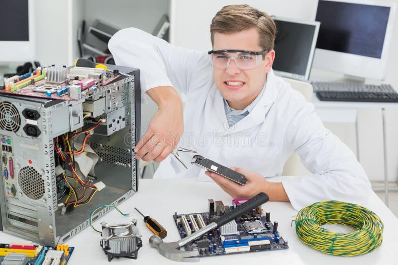 Angry Computer Engineer Working on Broken Device Stock Photo - Image of ...