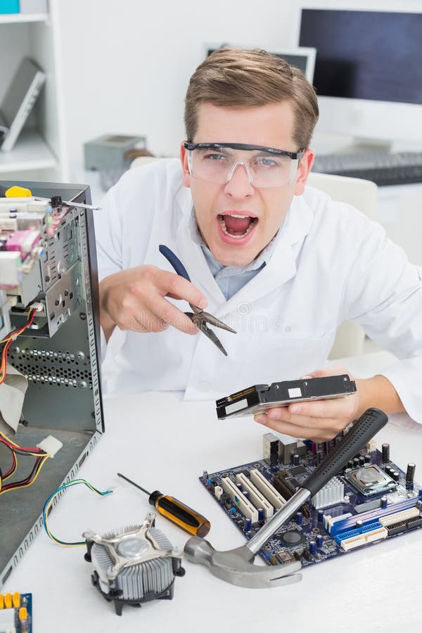 Angry Computer Engineer Working Broken Device Stock Photos - Free ...
