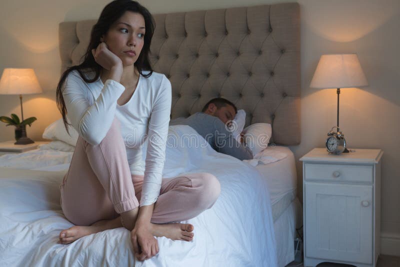 Angry Couple Avoiding Each Other in Bedroom Stock Image - Image of ...